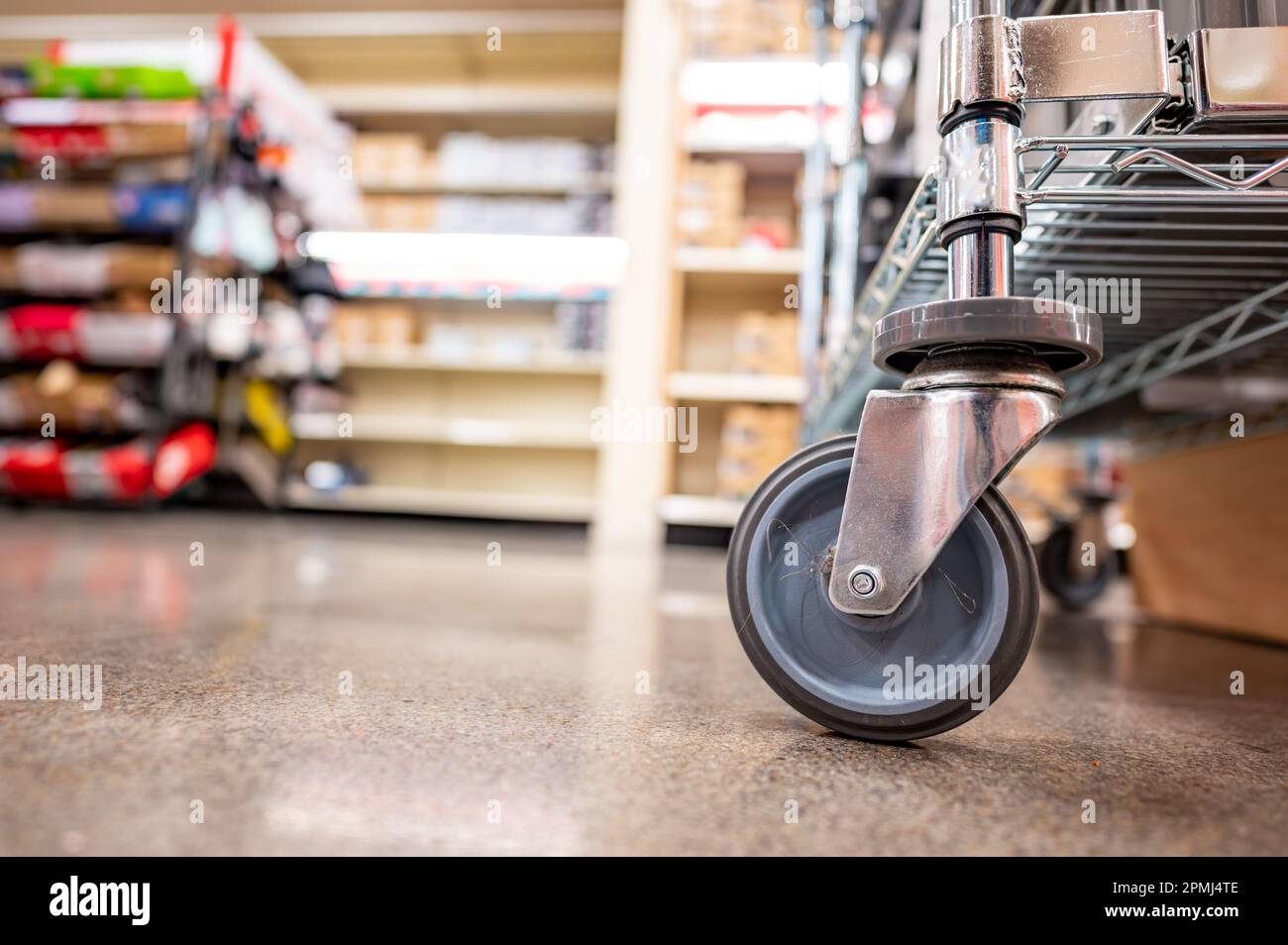 hair and thread wrapped around the axle of a caster wheel causing it to ...