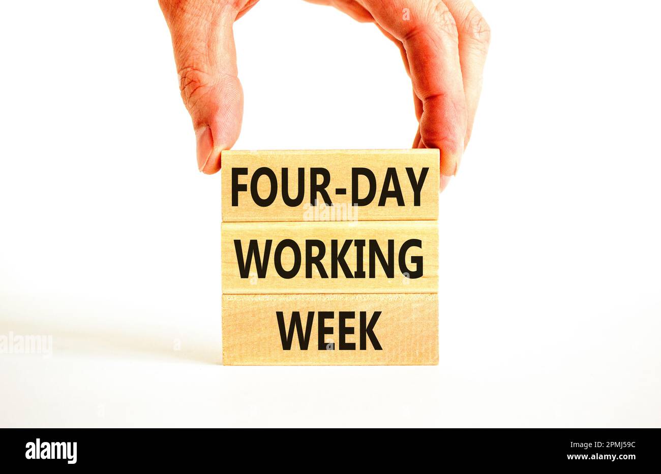Four-day working week symbol. Concept words Four-day working week on wooden block on a beautiful ...