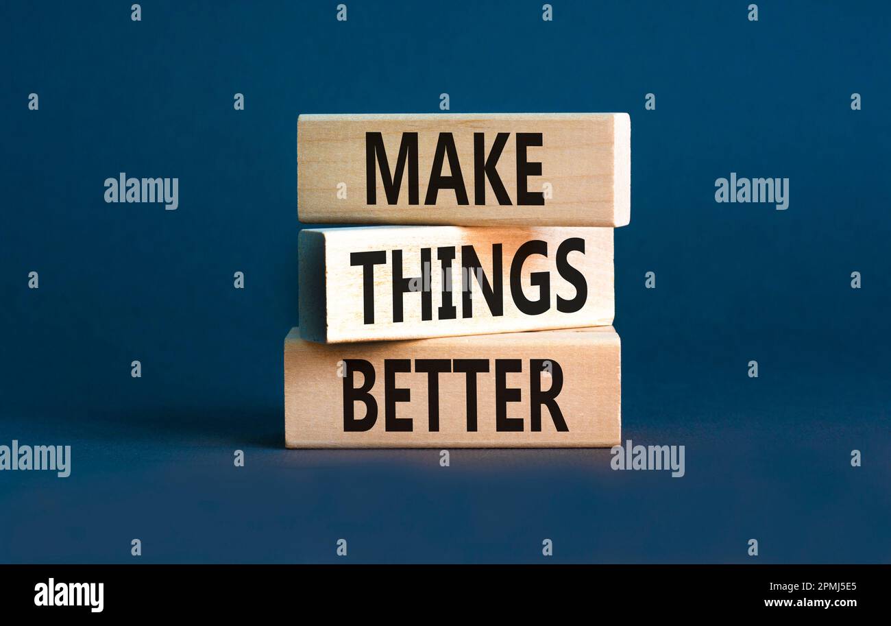 Make things better symbol. Concept words Make things better on wooden ...