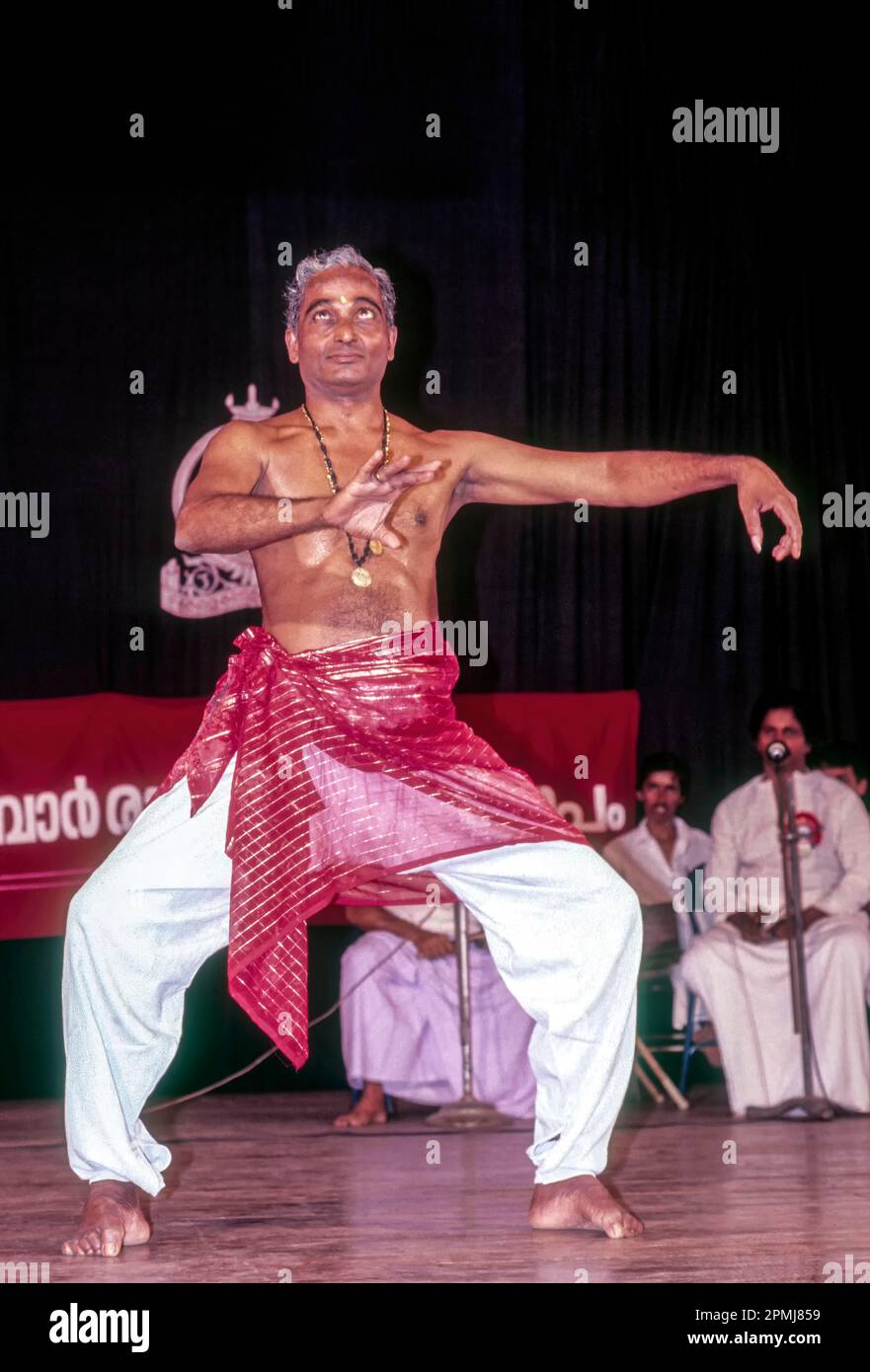 Kalamandalam Gopi demonstrating kathakali exercise in Kerala ...