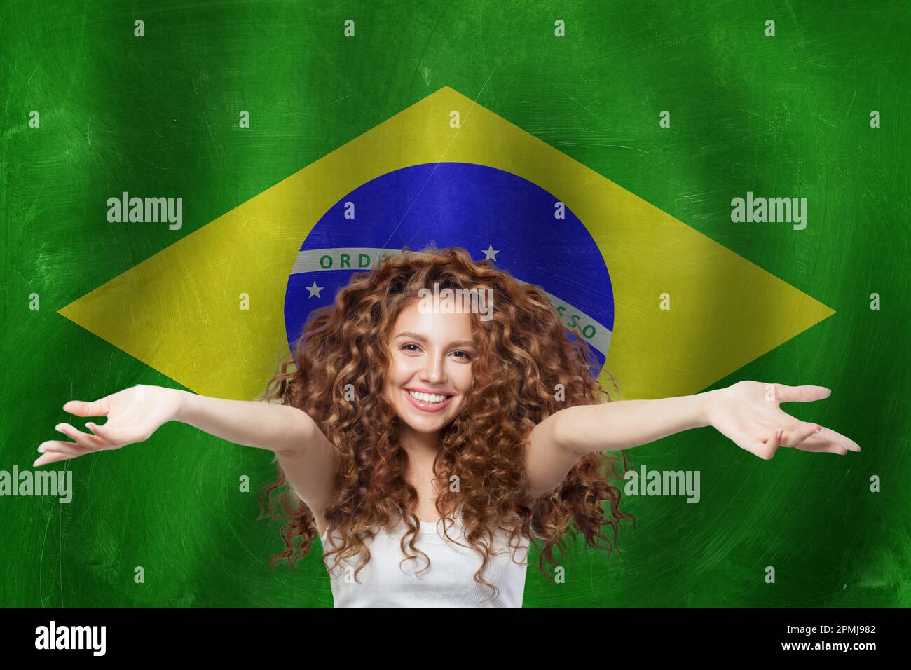 Welcome to Brazil. Happy woman with red suitcase on Brazilian flag ...