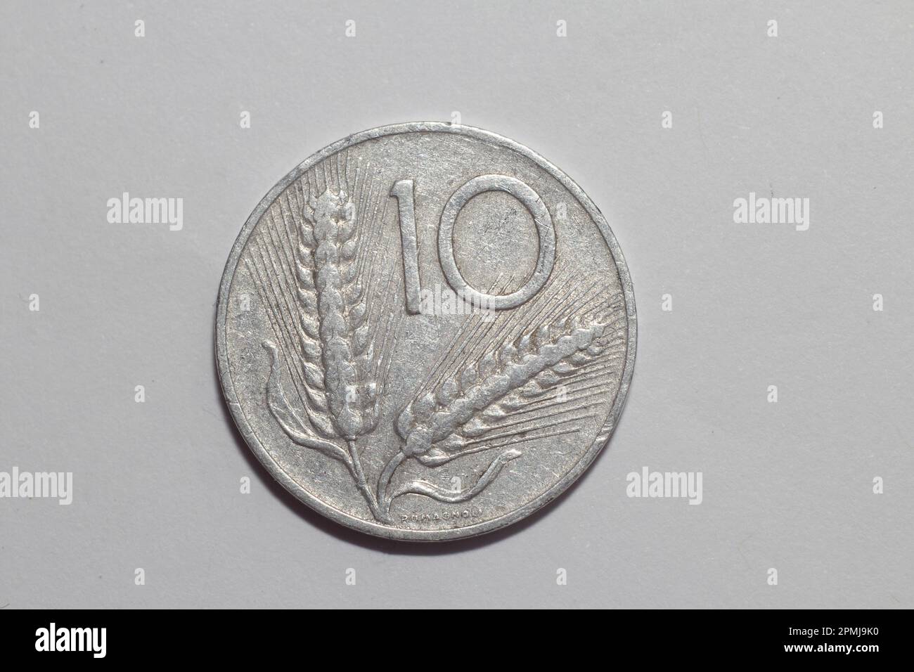 Coin of 10 lire, vintage italian coin Stock Photo - Alamy