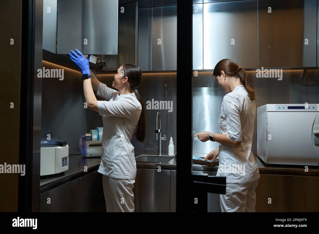 Working in modern private clinic hi-res stock photography and images ...