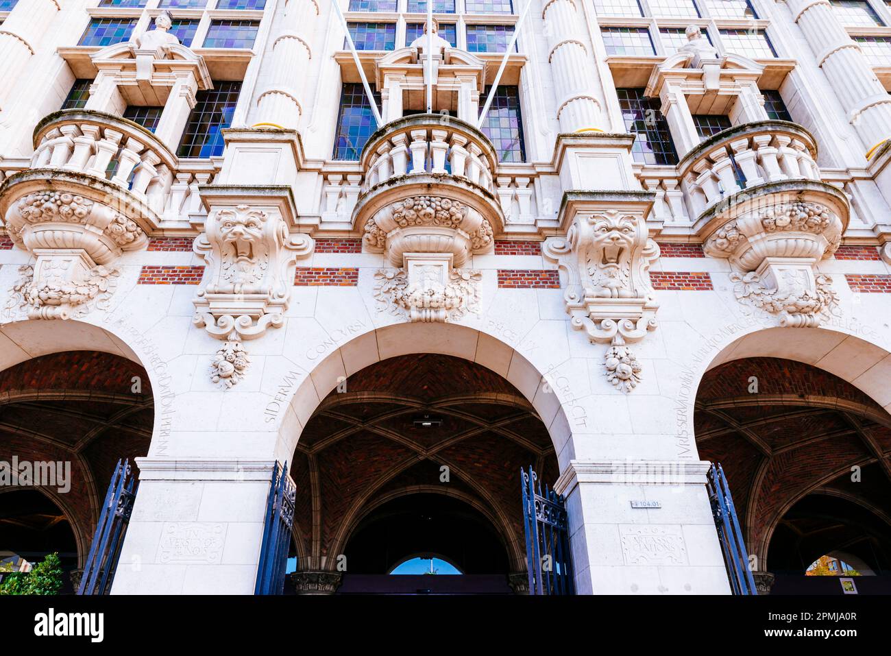 Entrance arches. Facade of central library of the Catholic University ...