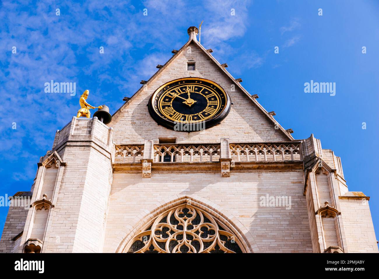 Clock, gothic window and Jacquemart. Saint Peter's Church is a Roman ...