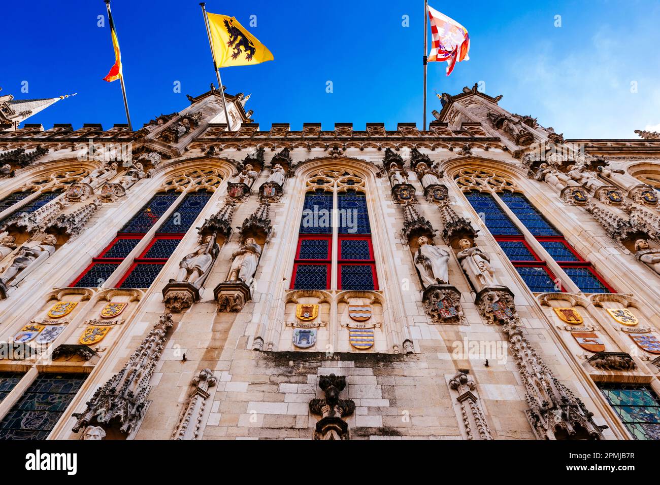 Detail facade. The City Hall of Bruges is one of the oldest city halls ...