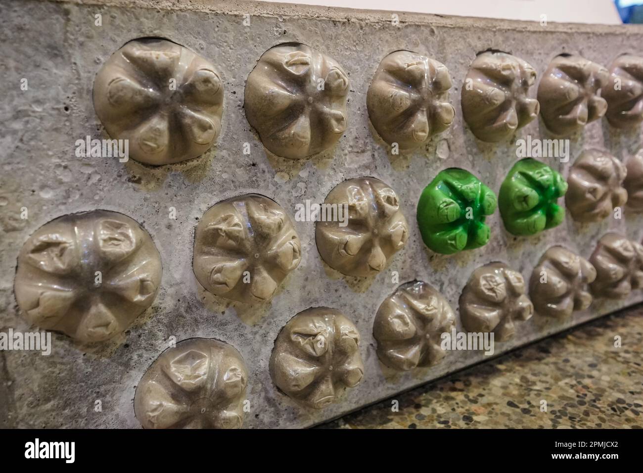 plastic bottles filled with mud or soil as materials to replace bricks ...