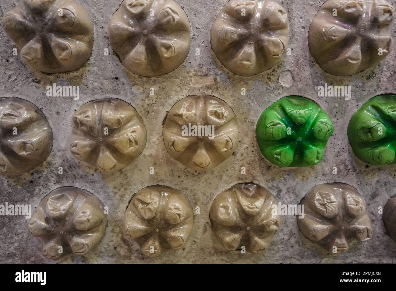 plastic bottles filled with mud or soil as materials to replace bricks ...