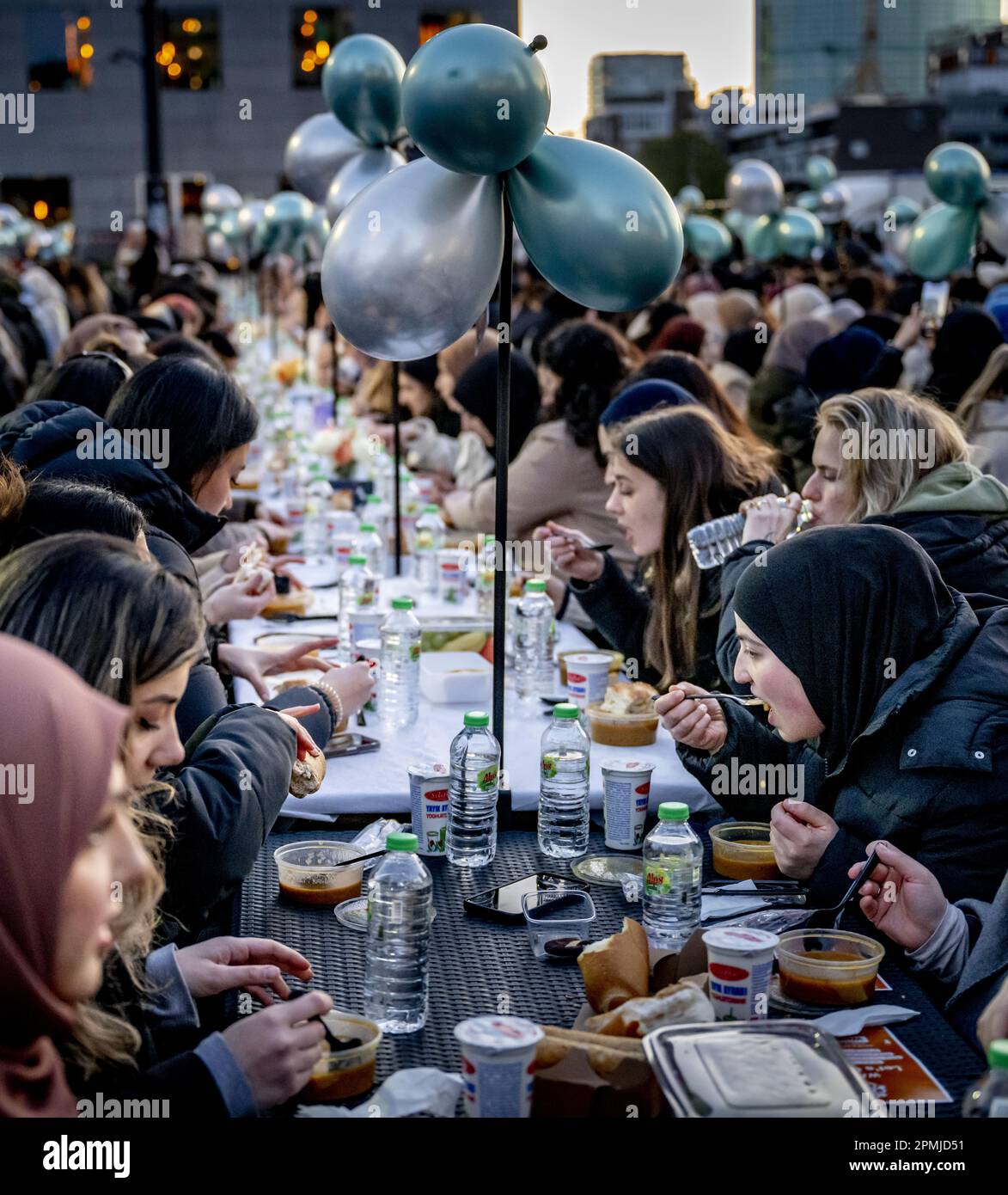ROTTERDAM - 13/04/2023, Visitors during the annual iftar on the street ...