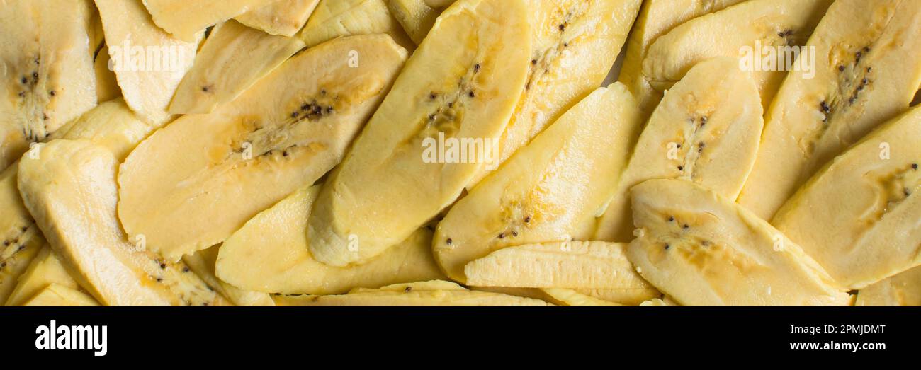 Top view of slices of ripe plantains , slices of yellow plantains for ...