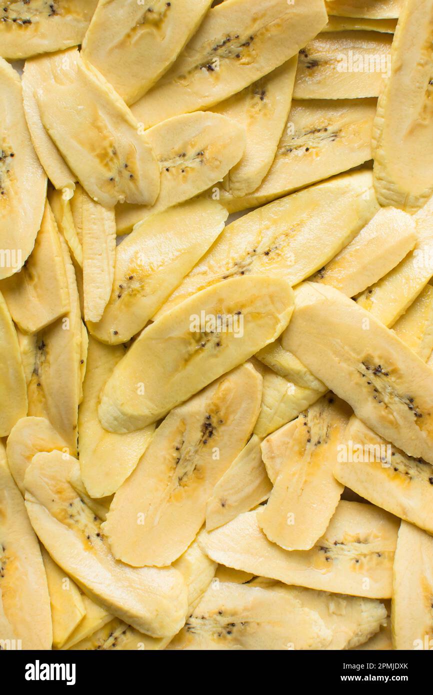 Top view of slices of ripe plantains , slices of yellow plantains for ...