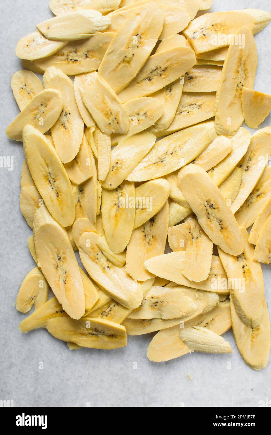 Top view of slices of ripe plantains , slices of yellow plantains for ...