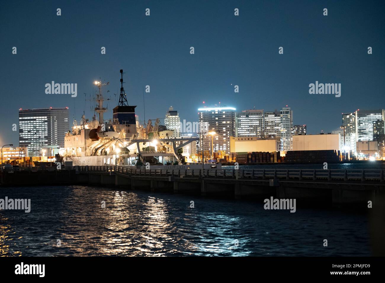 Tokyo, Japan. 9th Feb, 2023. A ship moored to a shipping terminal with ...