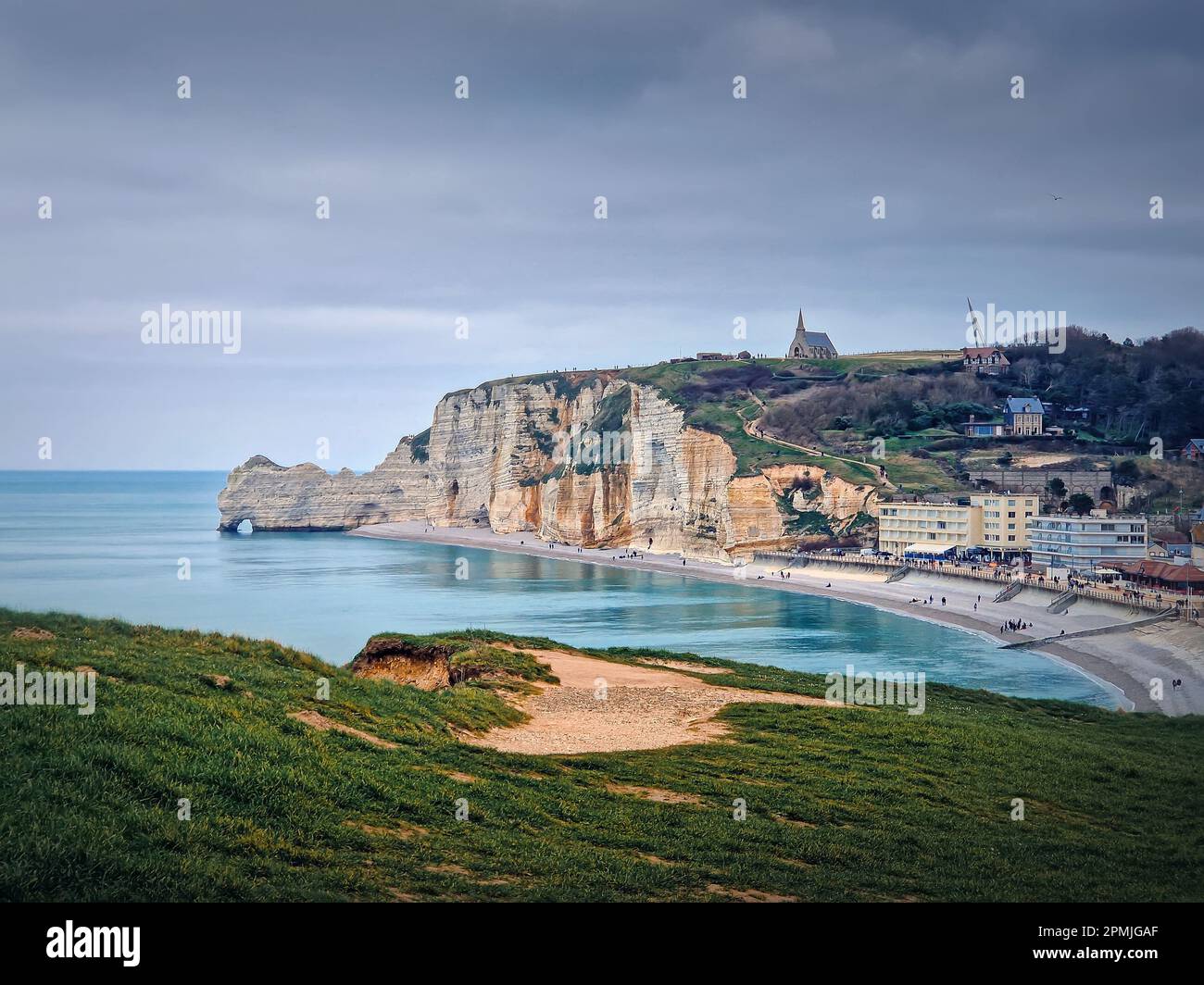 Sightseeing view to Etretat coastline with the famous Notre-Dame de la ...