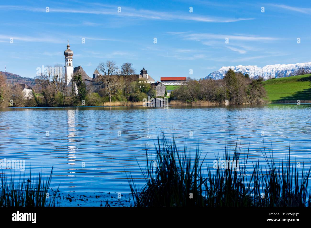 Anger: church St. Peter und Paul and former abbey Höglwörth, lake ...
