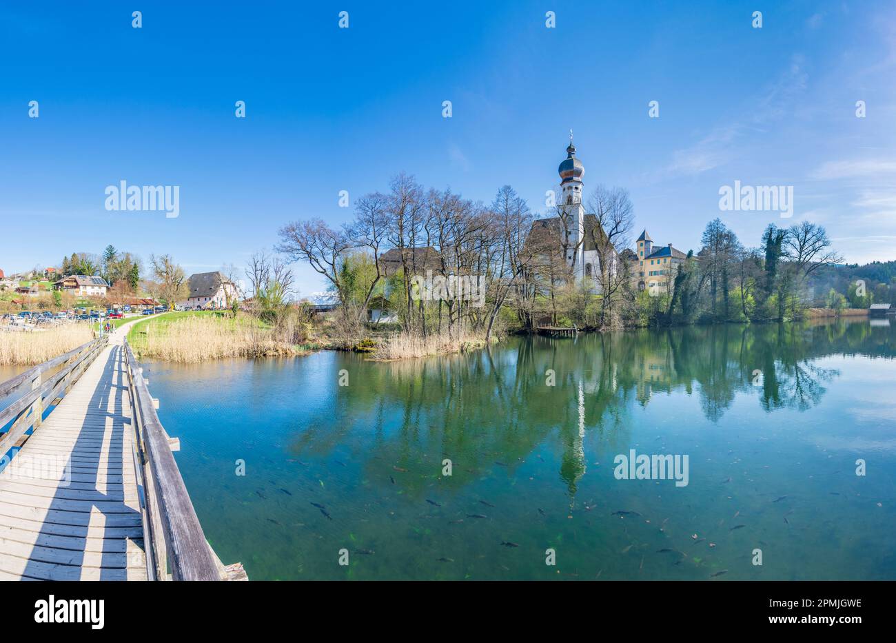 Anger: church St. Peter und Paul and former abbey Höglwörth, lake ...