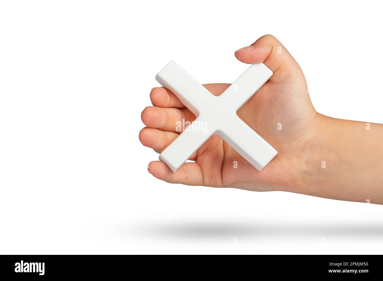 White multiplication symbol or cross in hand. The concept of ...