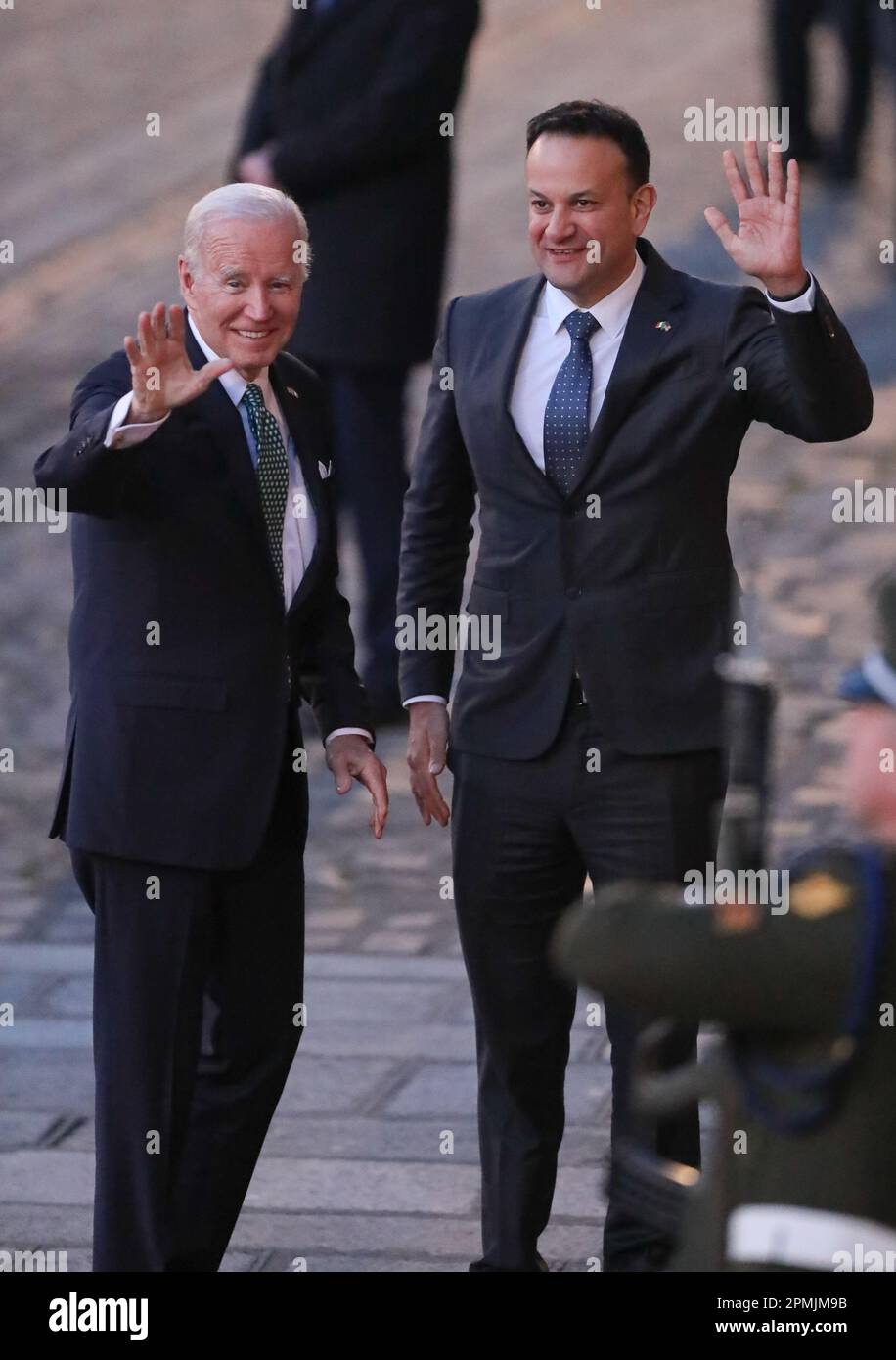US President Joe Biden (left) is greeted by Taoiseach Leo Varadkar as ...
