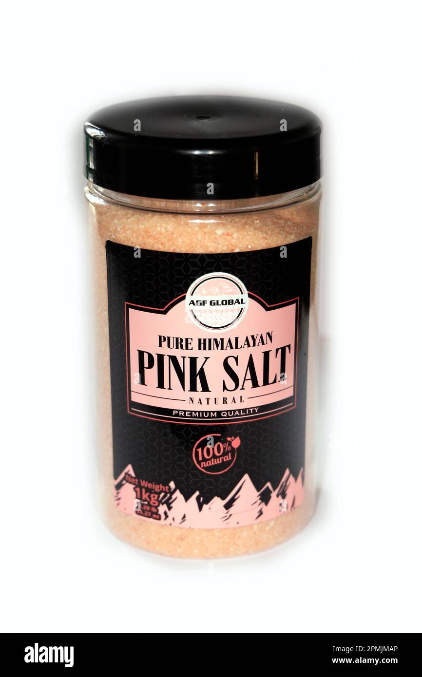 Large clear tub of Pure Himalayan Pink Rock salt Stock Photo - Alamy
