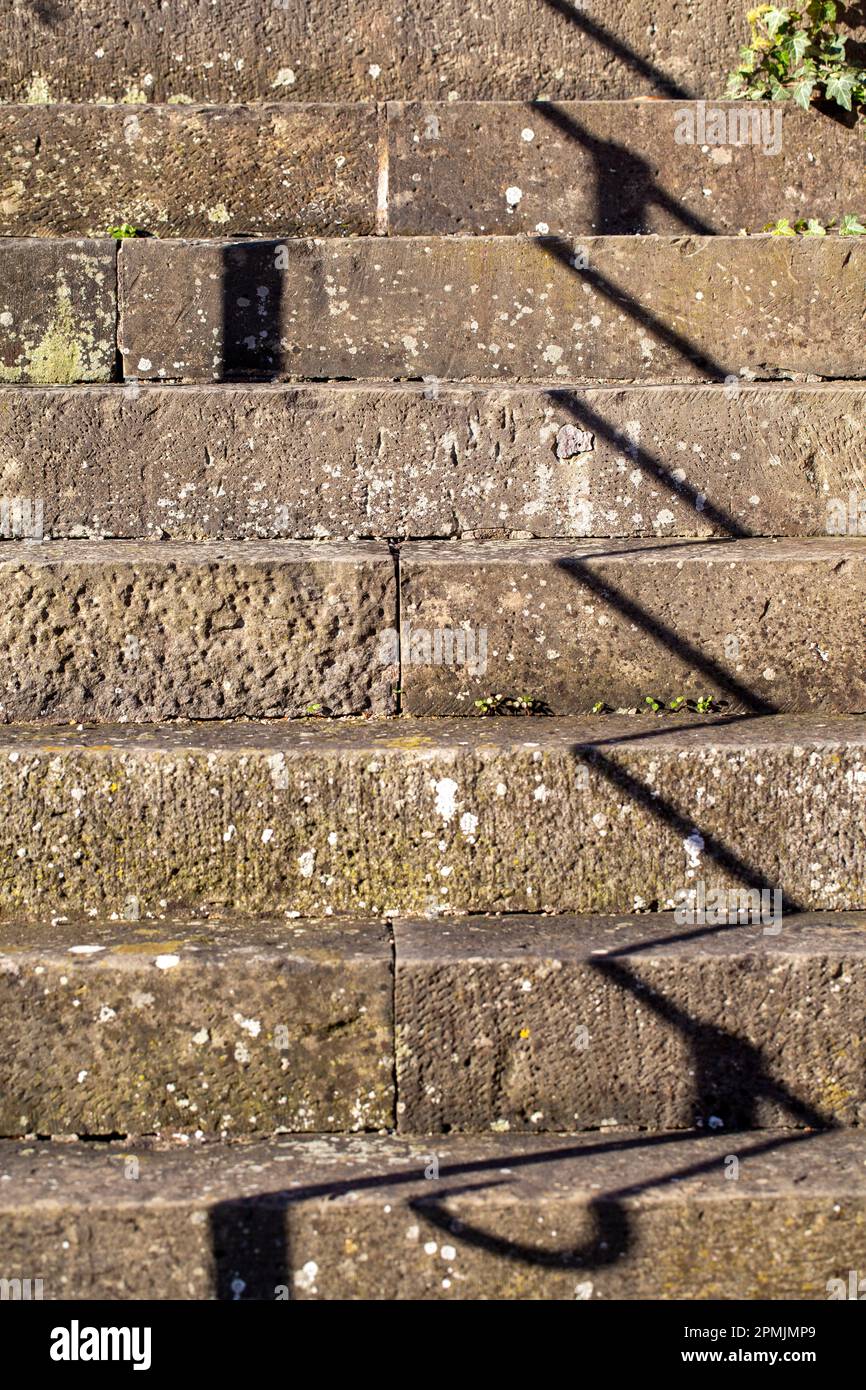 Antique stone stairs with the shadow of the railing Stock Photo - Alamy