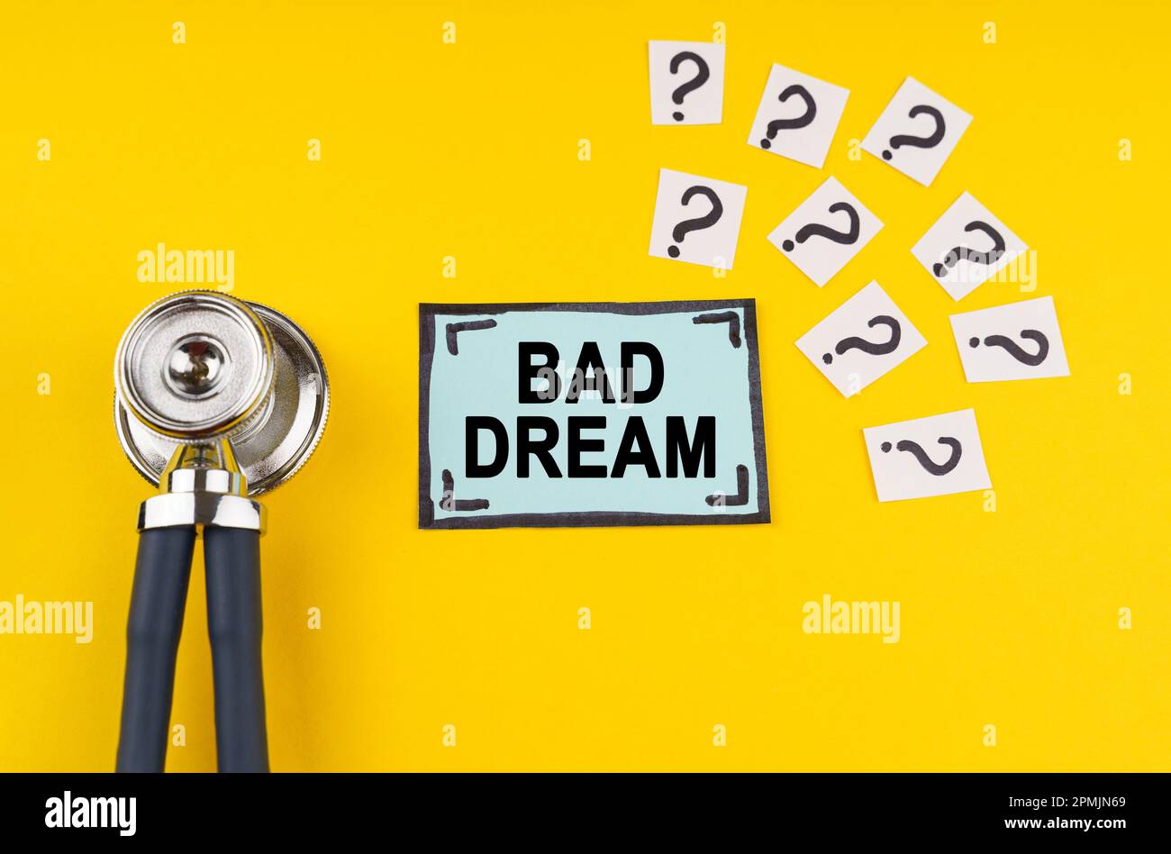 Medical concept. Question. On a yellow background a stethoscope ...