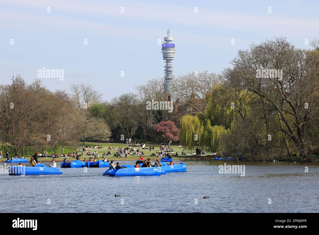 The boating lake in Regents Park, with the BT tower beyond, on a sunny ...