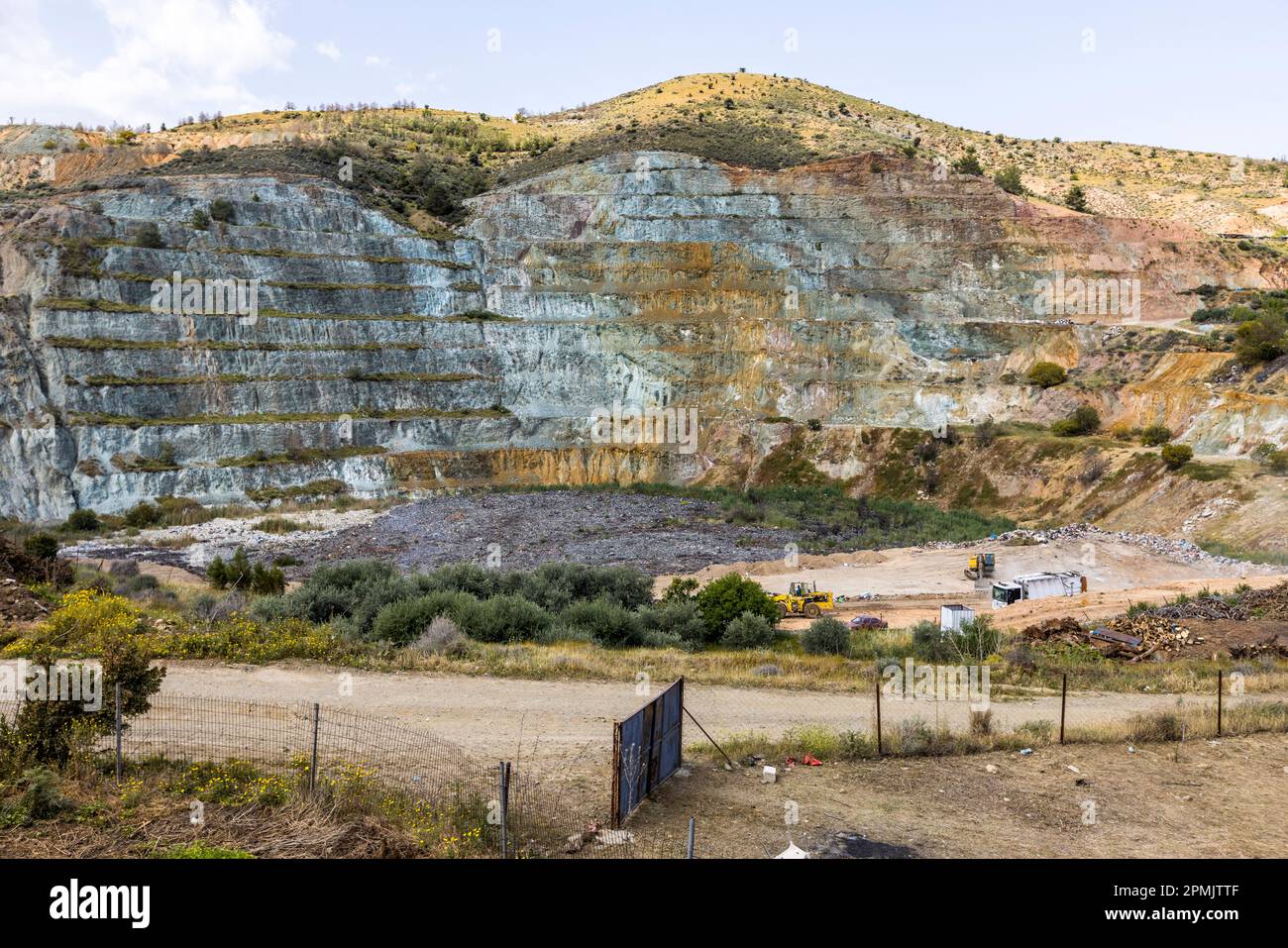 The open pit of the former copper mine is now used as a waste dump near ...