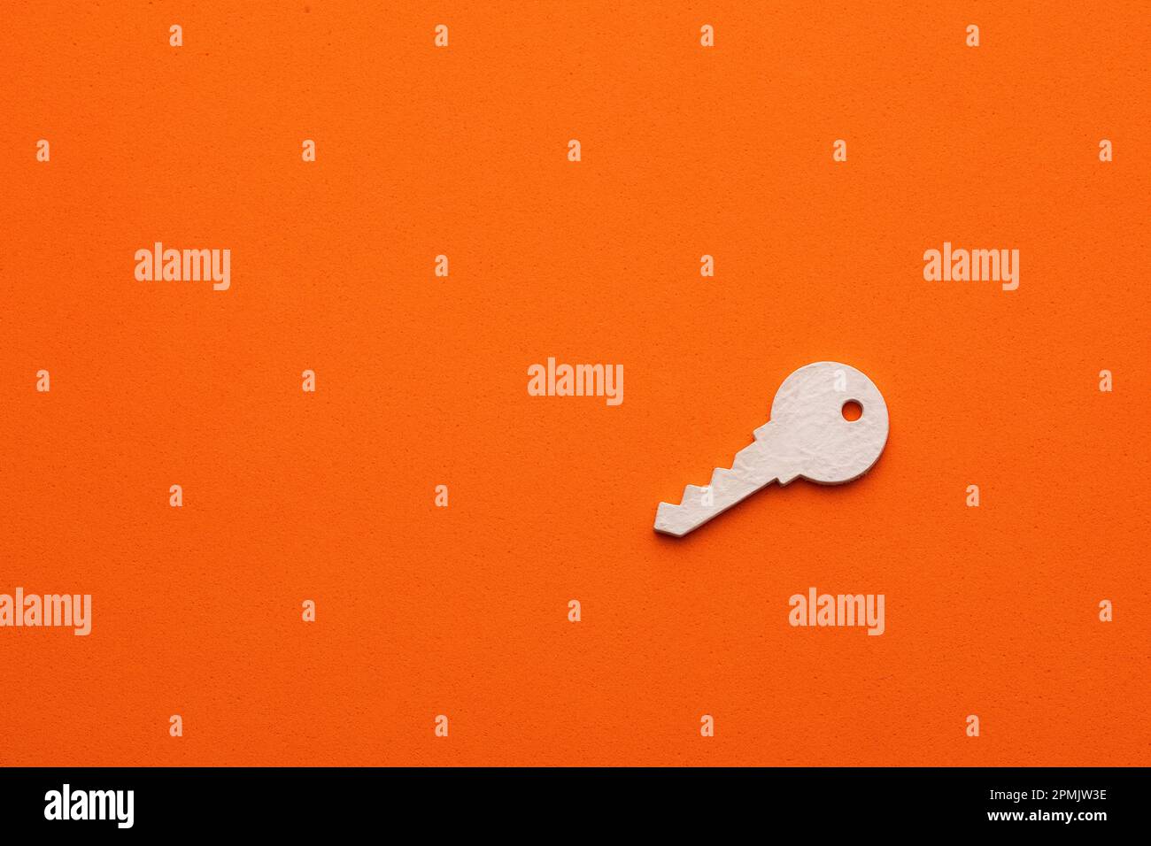 Single key on orange color background - Real estate concept, flat ...