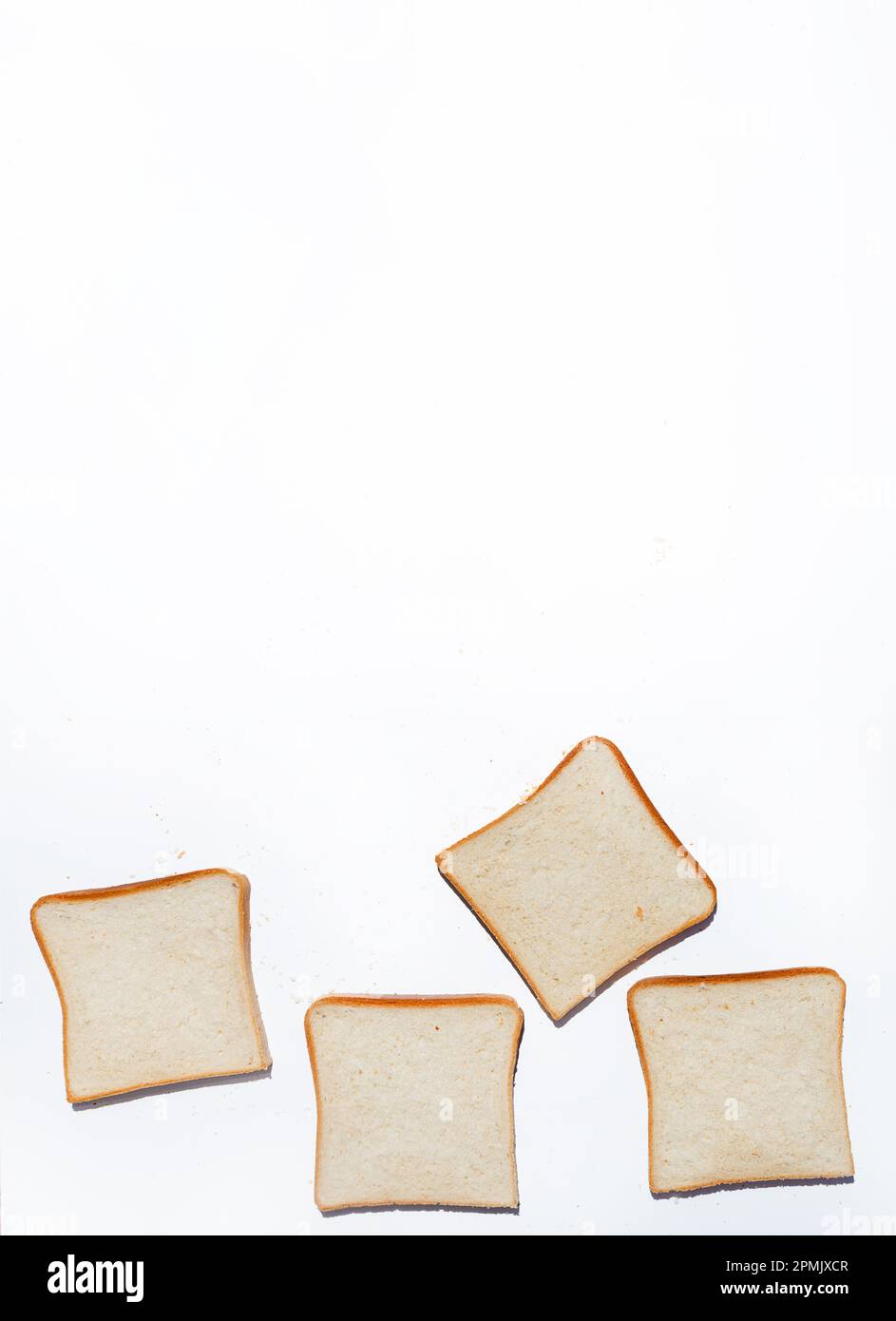 Top view of white toast bread slices with crumbs on isolated white ...