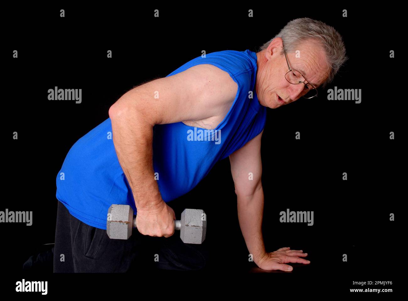 Senior citizen fitness training by lifting weights Stock Photo - Alamy