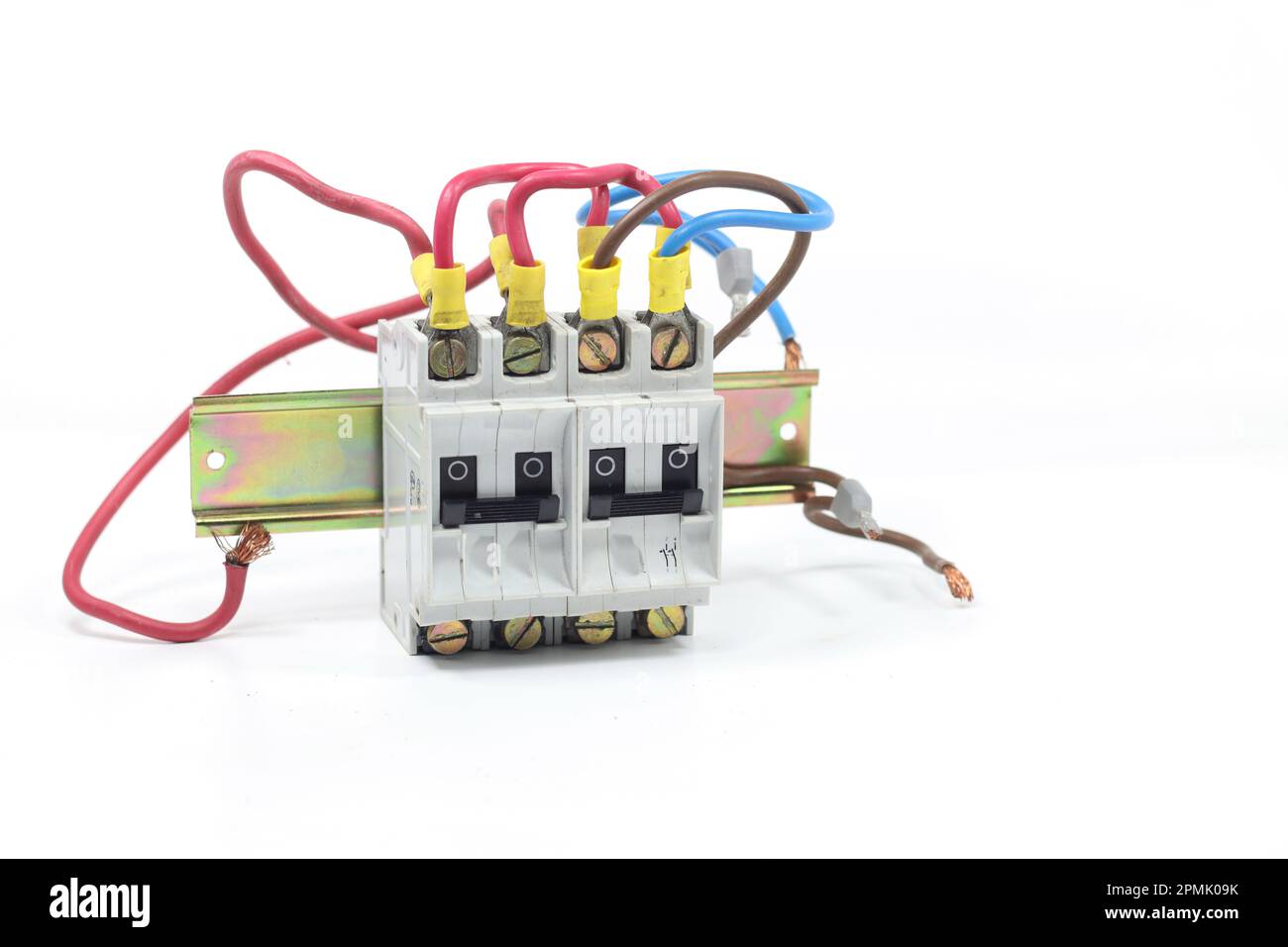 This stock photo features an electronic device with four colored wires ...