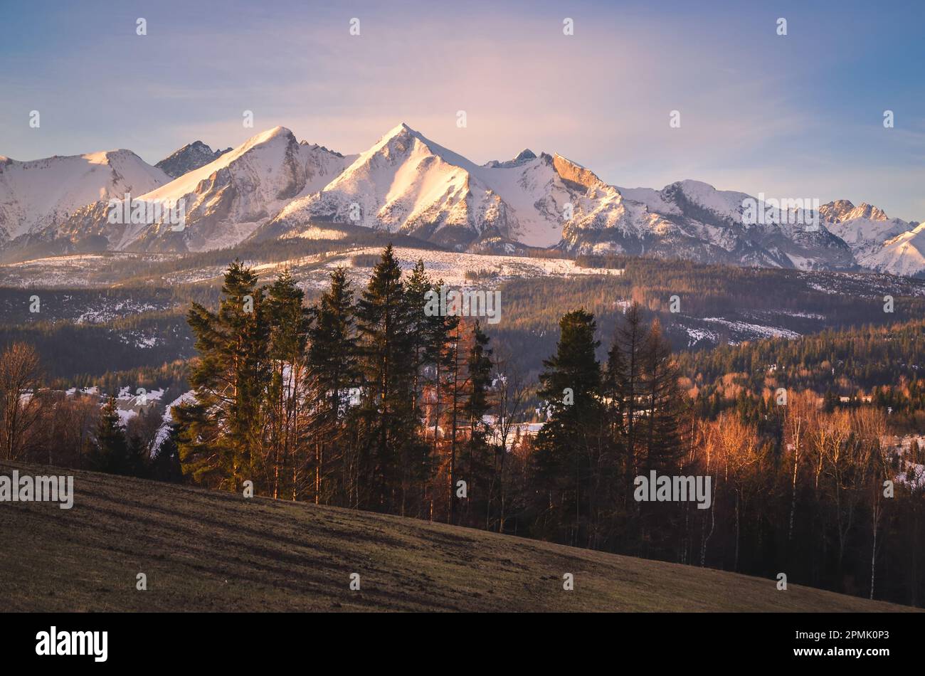 Charming panorama of the Polish Tatra Mountains in the morning. View of ...