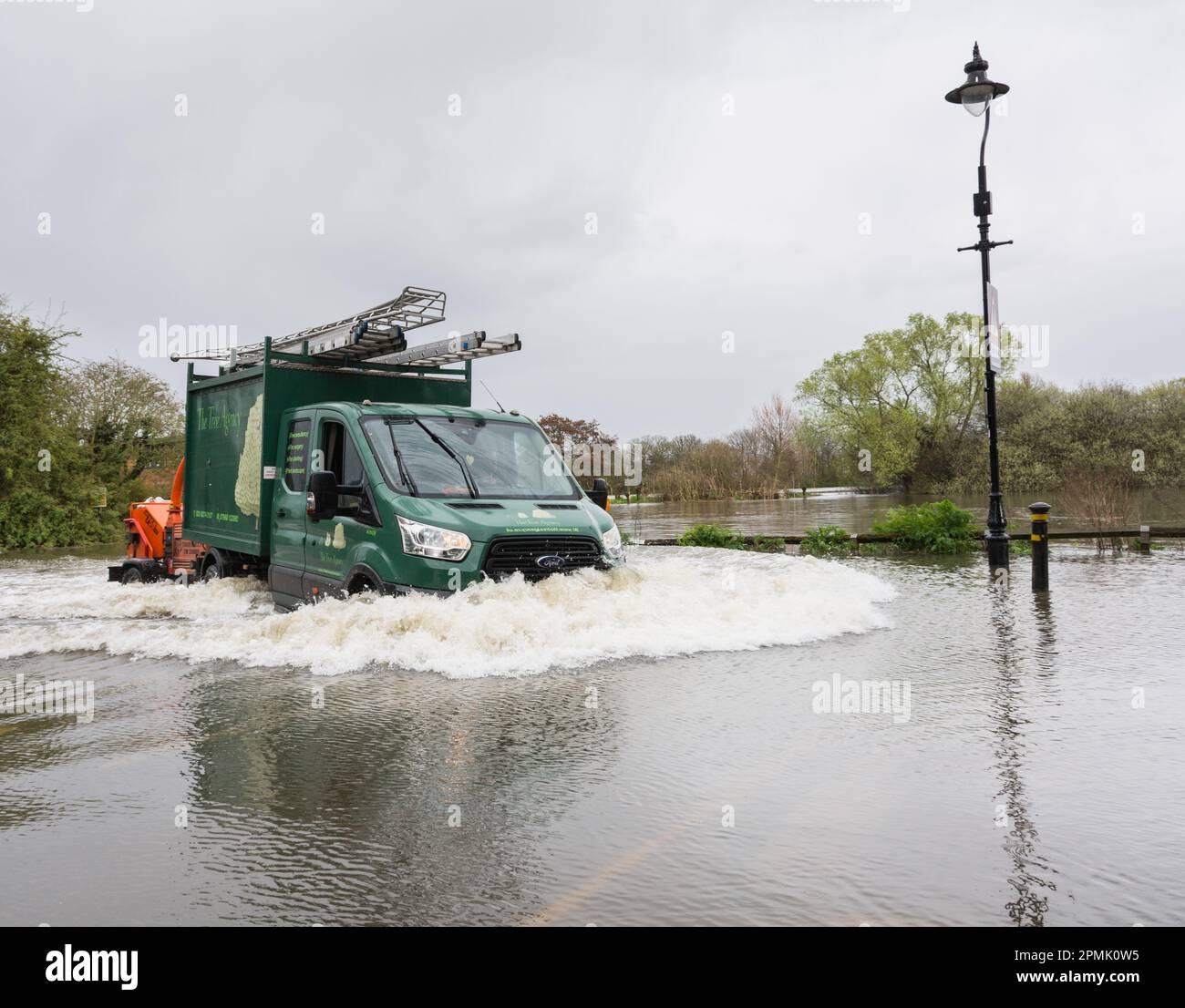 A Tree Agency van battling through floodwater on Chiswick Mall in ...