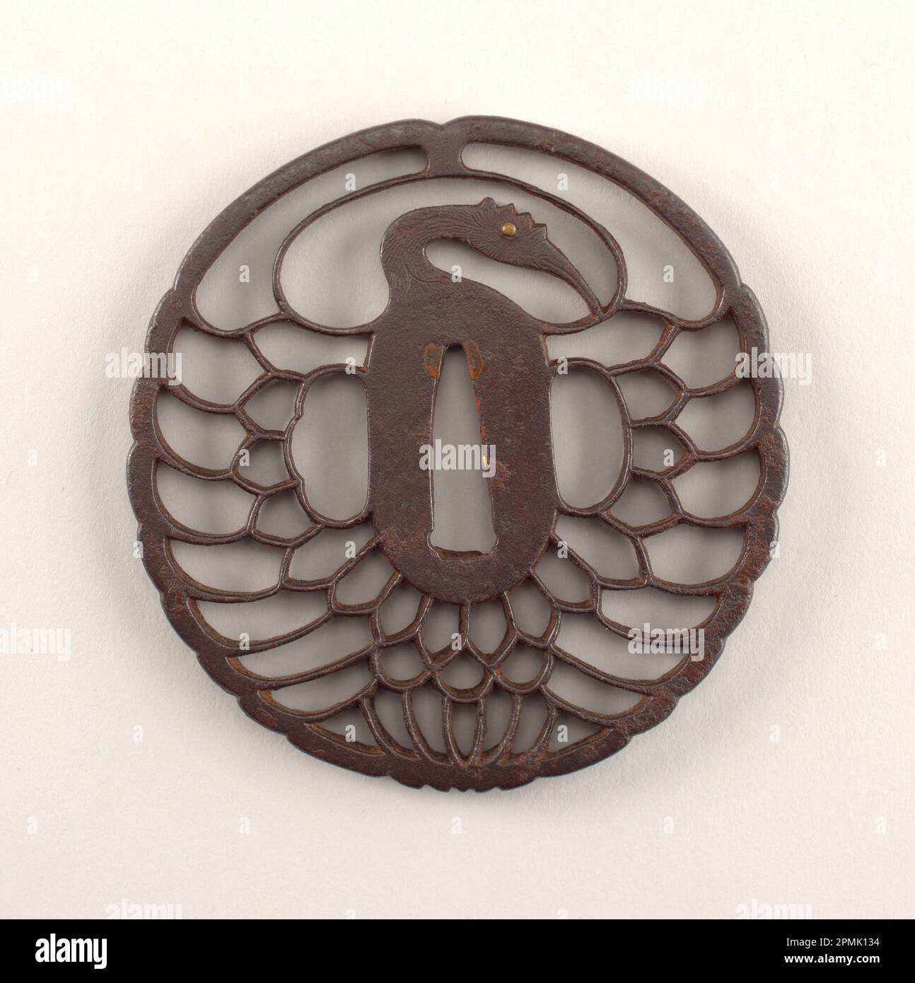 Chrysanthemum crane Tsuba; Japan; iron, shakudo (a soft copper and gold ...