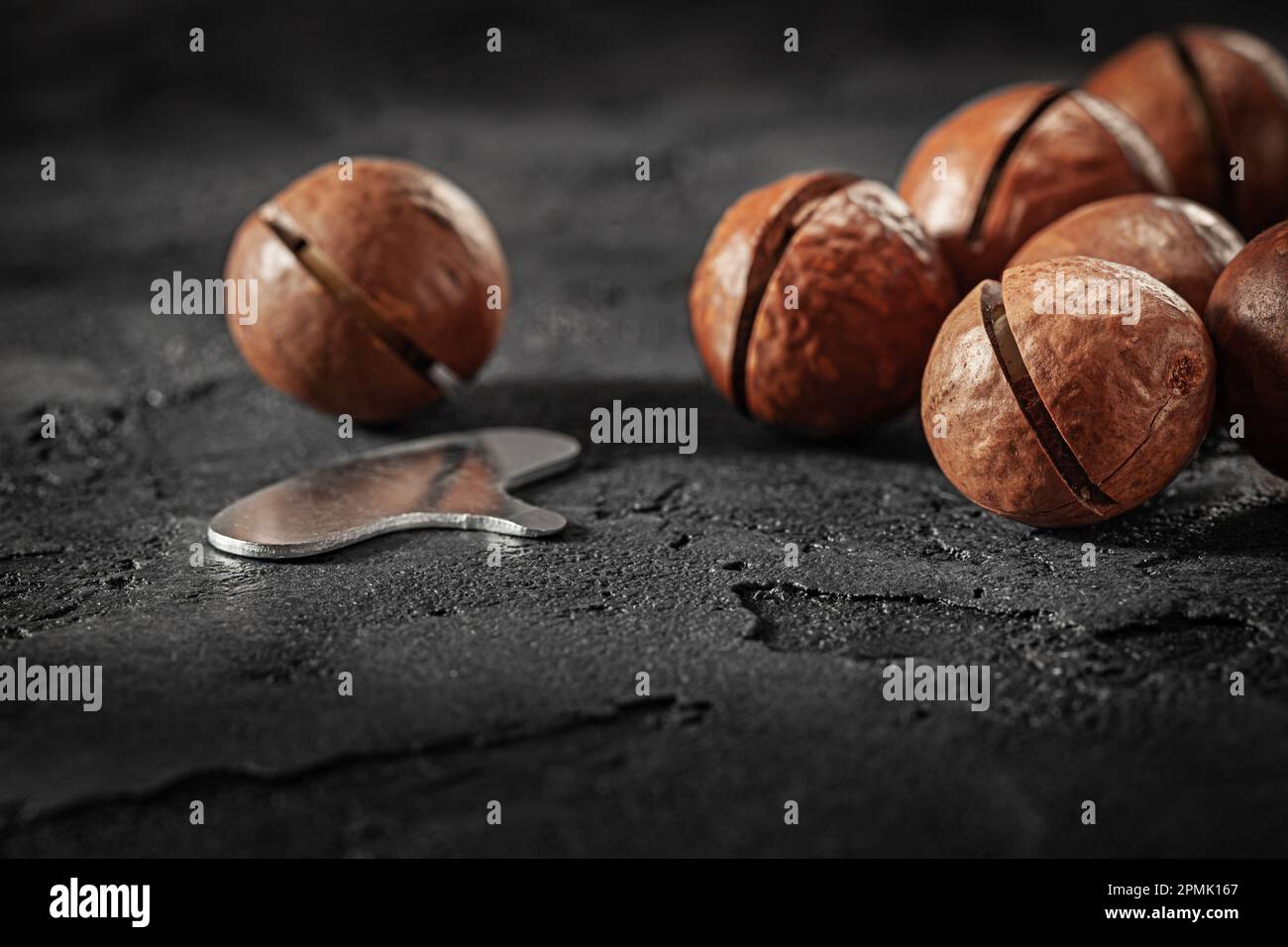 Macadamia Nuts With Key For Open It Stock Photo - Alamy