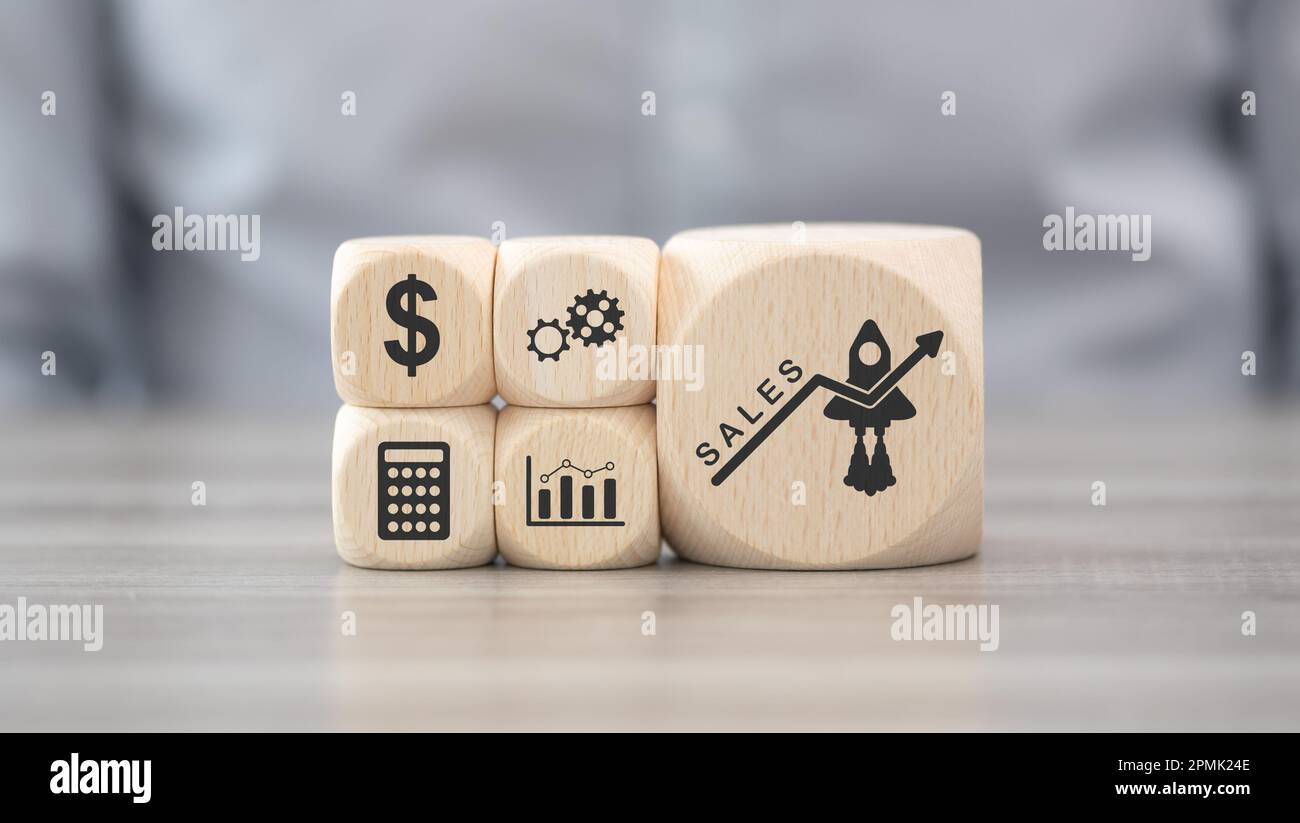 Wooden blocks with symbol of sales growth concept Stock Photo - Alamy