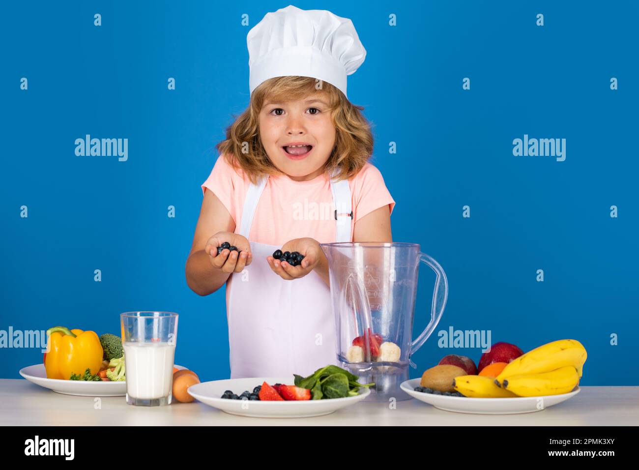 Excited funny chef cook. Child chef isolated on blue. Funny little kid ...