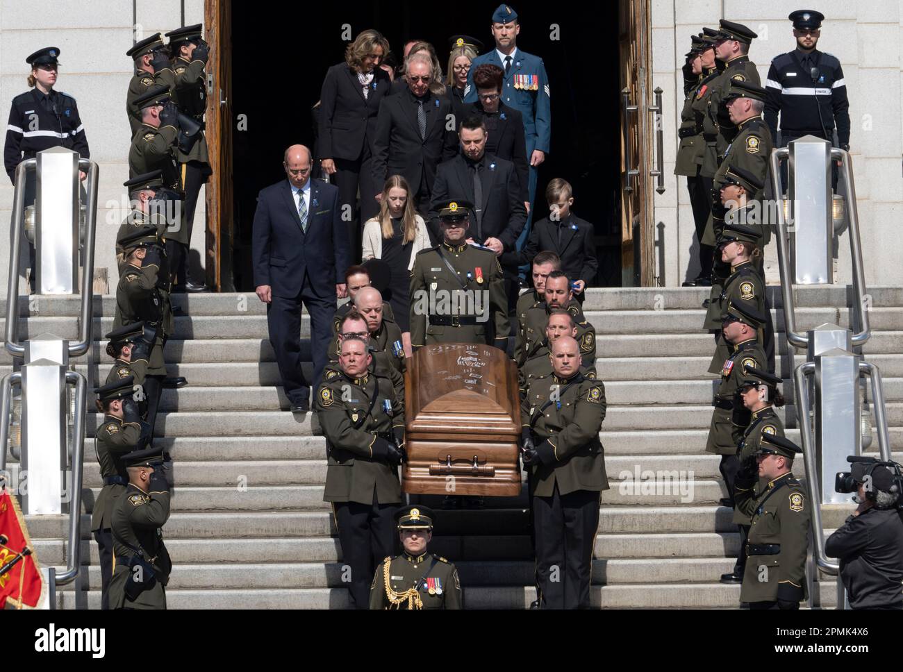 Trois Rivieres, Canada. 13th Apr, 2023. Family members follow the ...