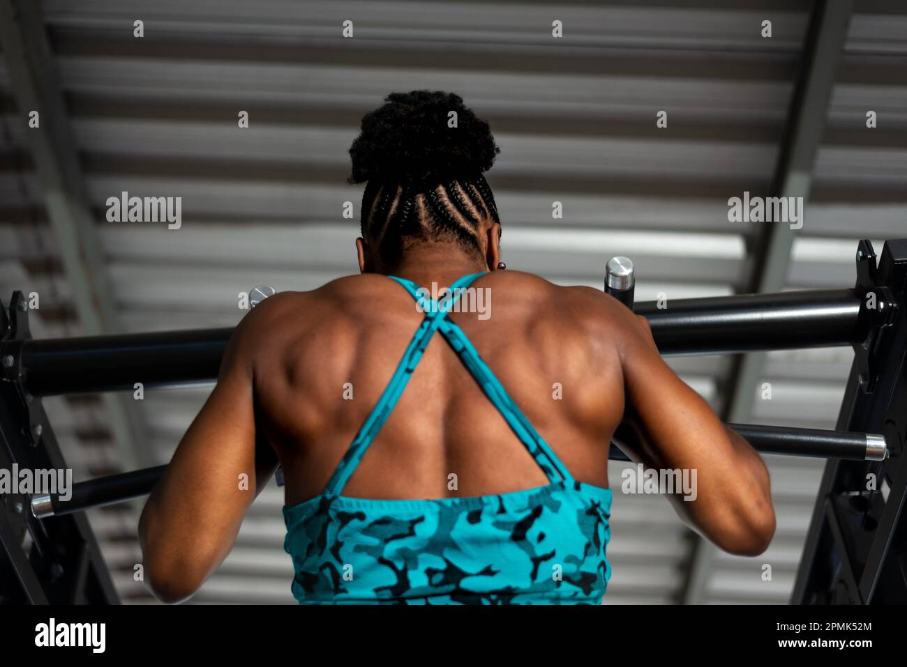 Muscular woman doing push-ups in the gym. Crossfit training Stock Photo ...