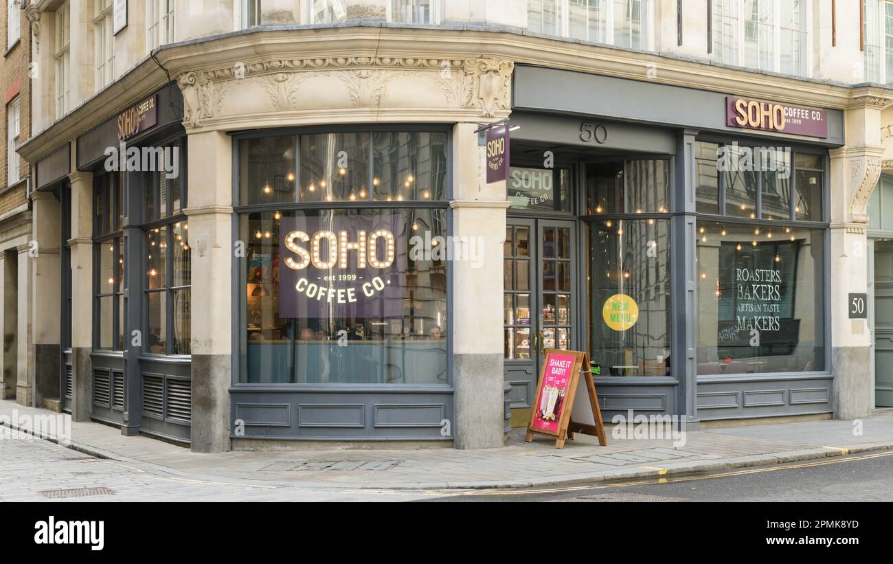 London, UK -March 16, 2023; SOHO Coffee Company corner store in London with sign and logo Stock ...