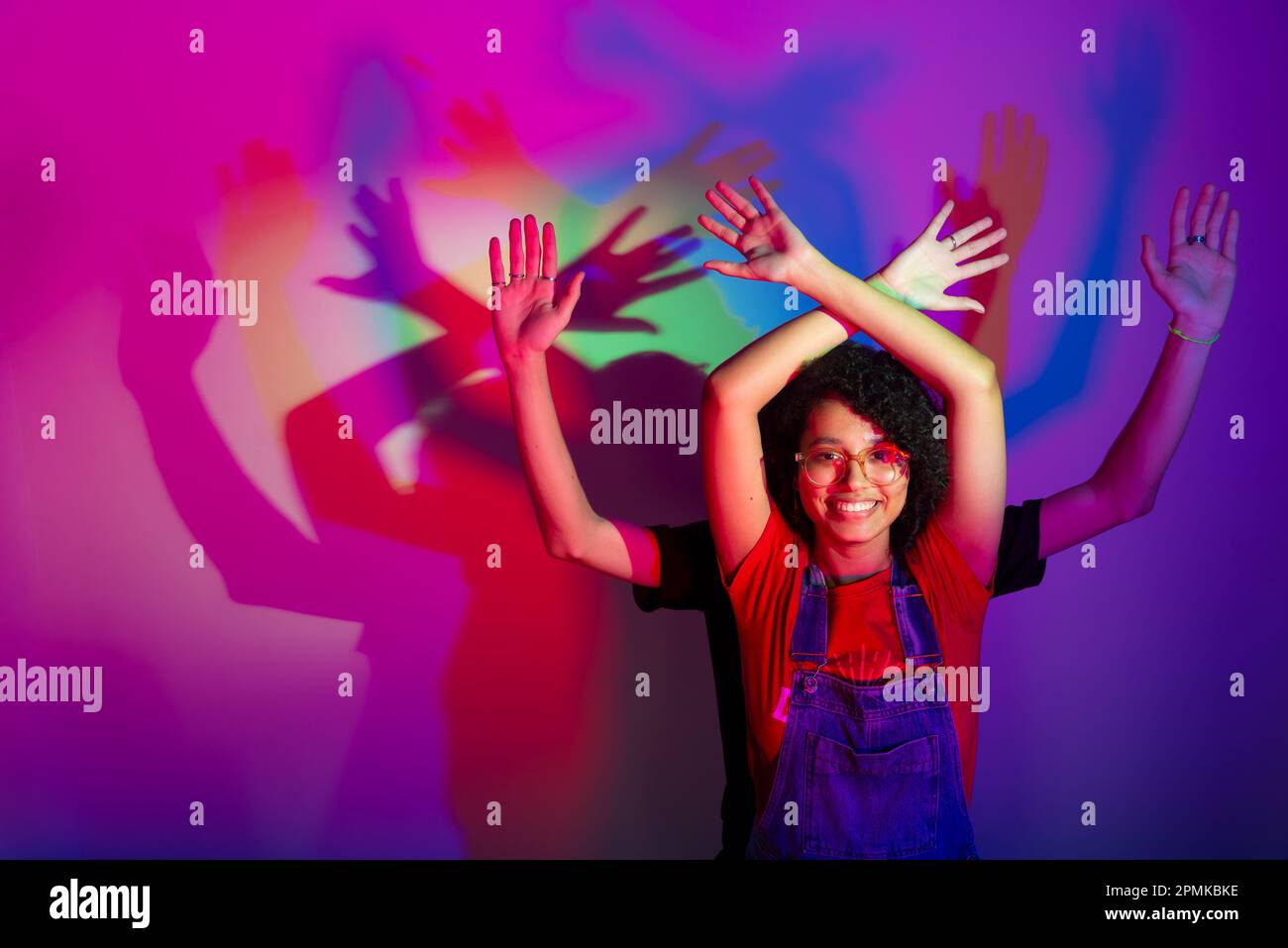 Portrait of two young lovers, isolated on background with colored ...