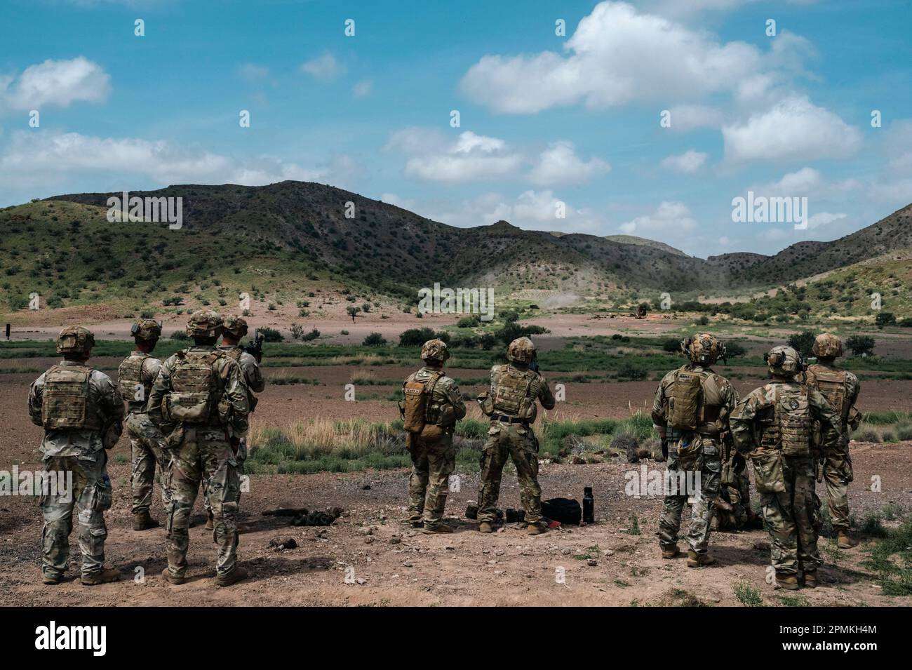 U.S. Army soldiers assigned to Task Force Wolfhound fire M320 grenade ...