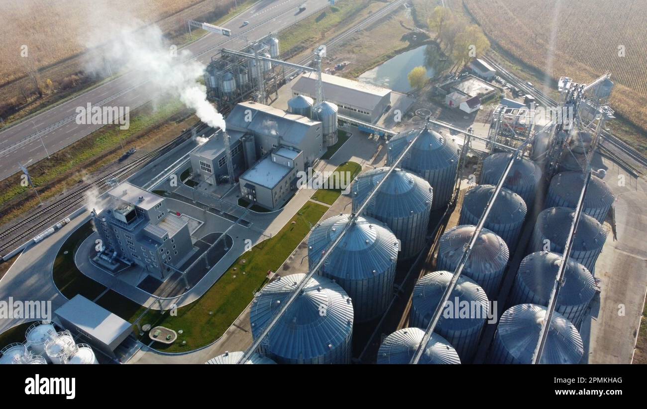 Grain elevator. Granary. Large metal structure grain elevator. Storage ...