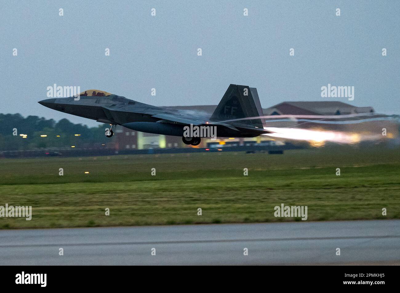 An F-22 Raptor, assigned to the 94th Fighter Squadron, takes flight to ...