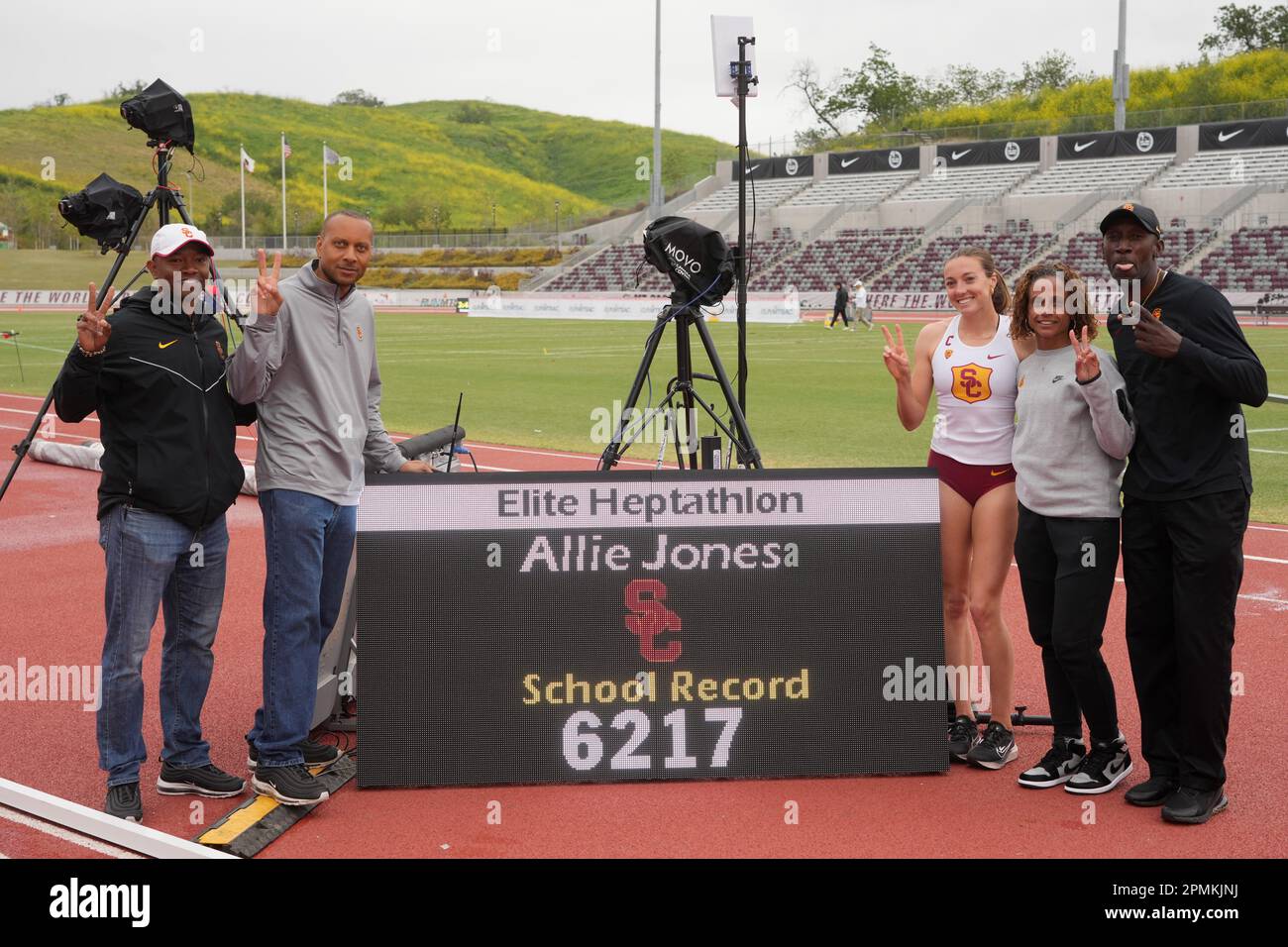 Allie Jones of Southern California (third from right) poses with coaches (from left) Jebreh ...