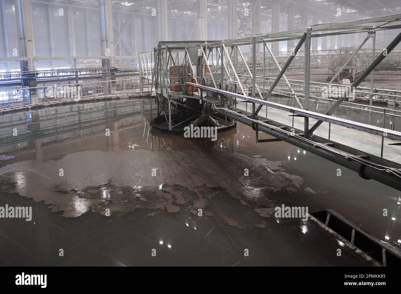 Large round floatation machine tank full of liquid at plant Stock Photo ...