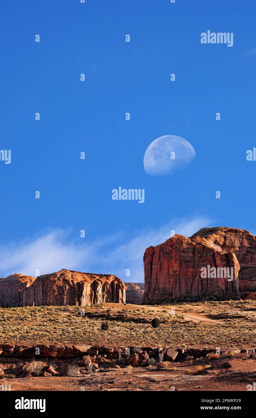 Gibbous Large moon over Monument Valley Arizona Stock Photo - Alamy