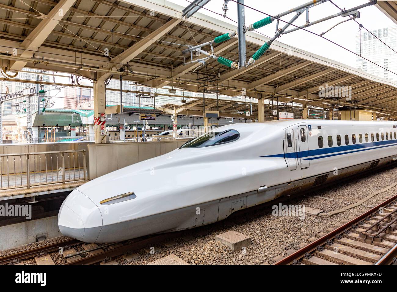 Tokyo station bullet train Shinkansen at the platform ready to depart at high speed, Japanese ...