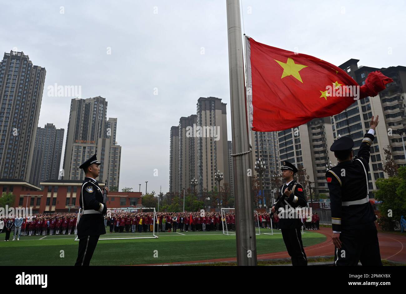 NEIJIANG, CHINA - APRIL 14, 2023 - Teachers and students attend a flag ...