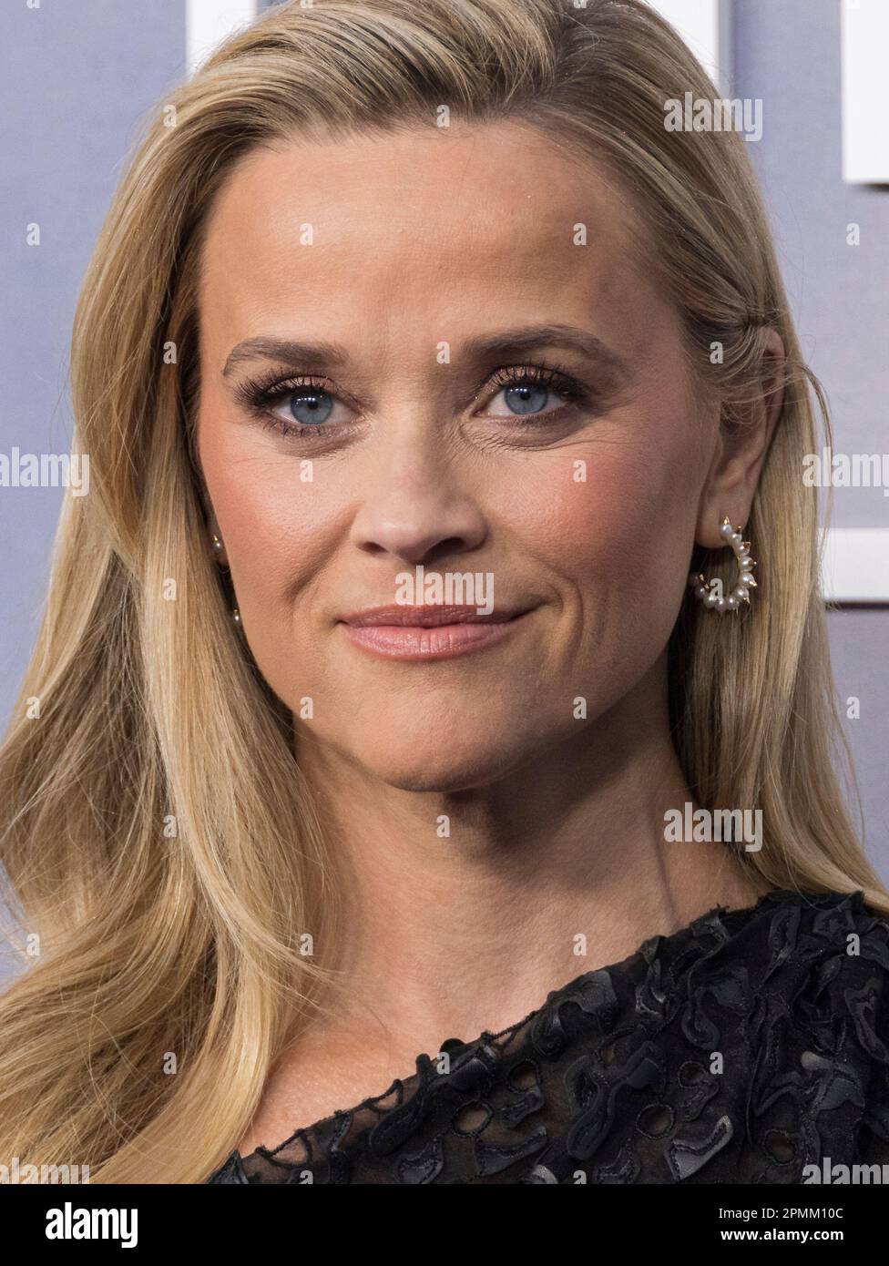 Reese Witherspoon arrives at the premiere of "The Last Thing He Told Me ...